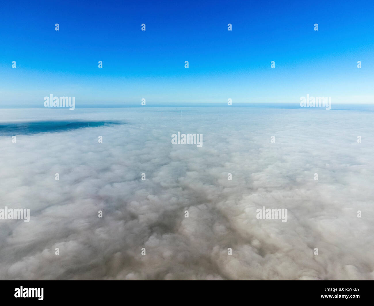 Flying over sunrise clouds near hi-res stock photography and images - Alamy
