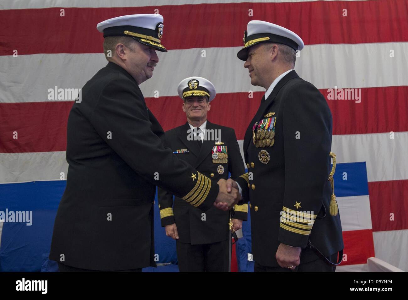 SASEBO, Japan (April 20, 2017) Capt. Larry McCullen (left) relieves ...