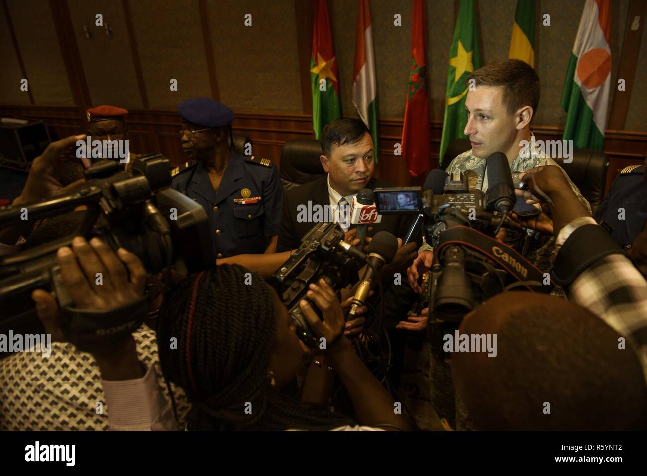 U.S. Air Force Capt. Thomas Bowen, right, translates for Col. Ric ...
