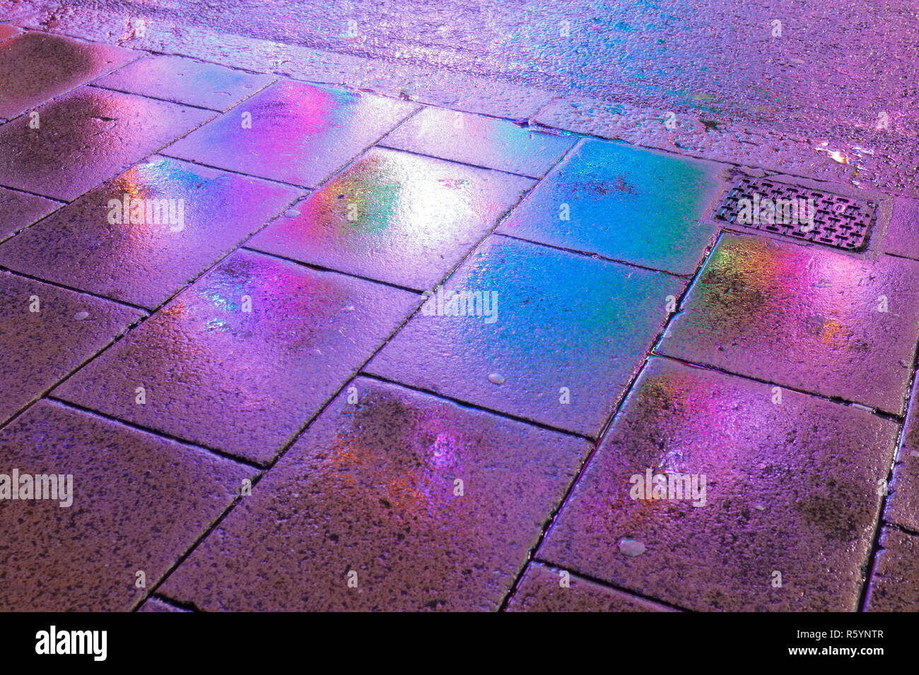 Wet pavement reflections of the big wheel in Leeds Stock Photo - Alamy