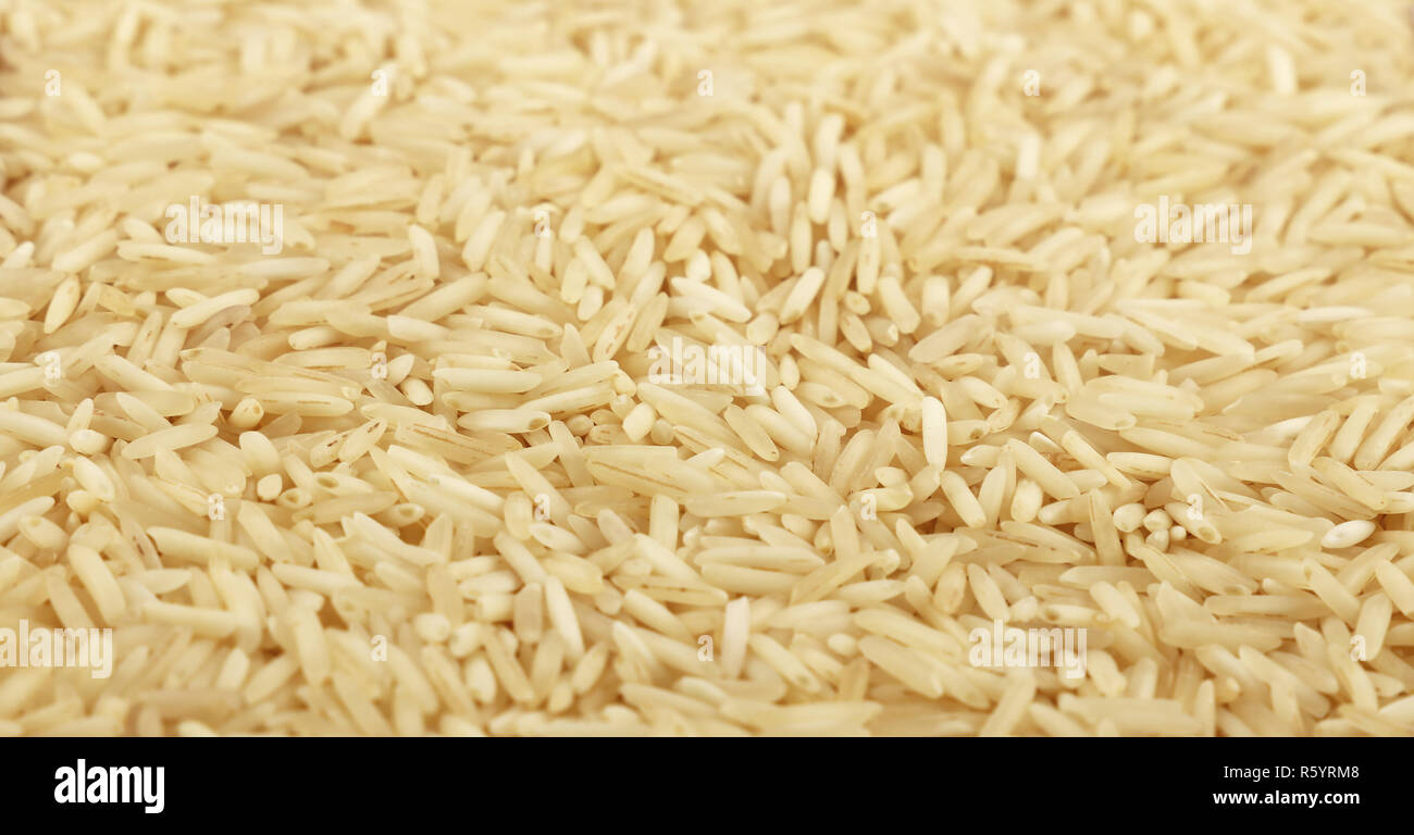 White Indian Basmati rice close up background Stock Photo - Alamy