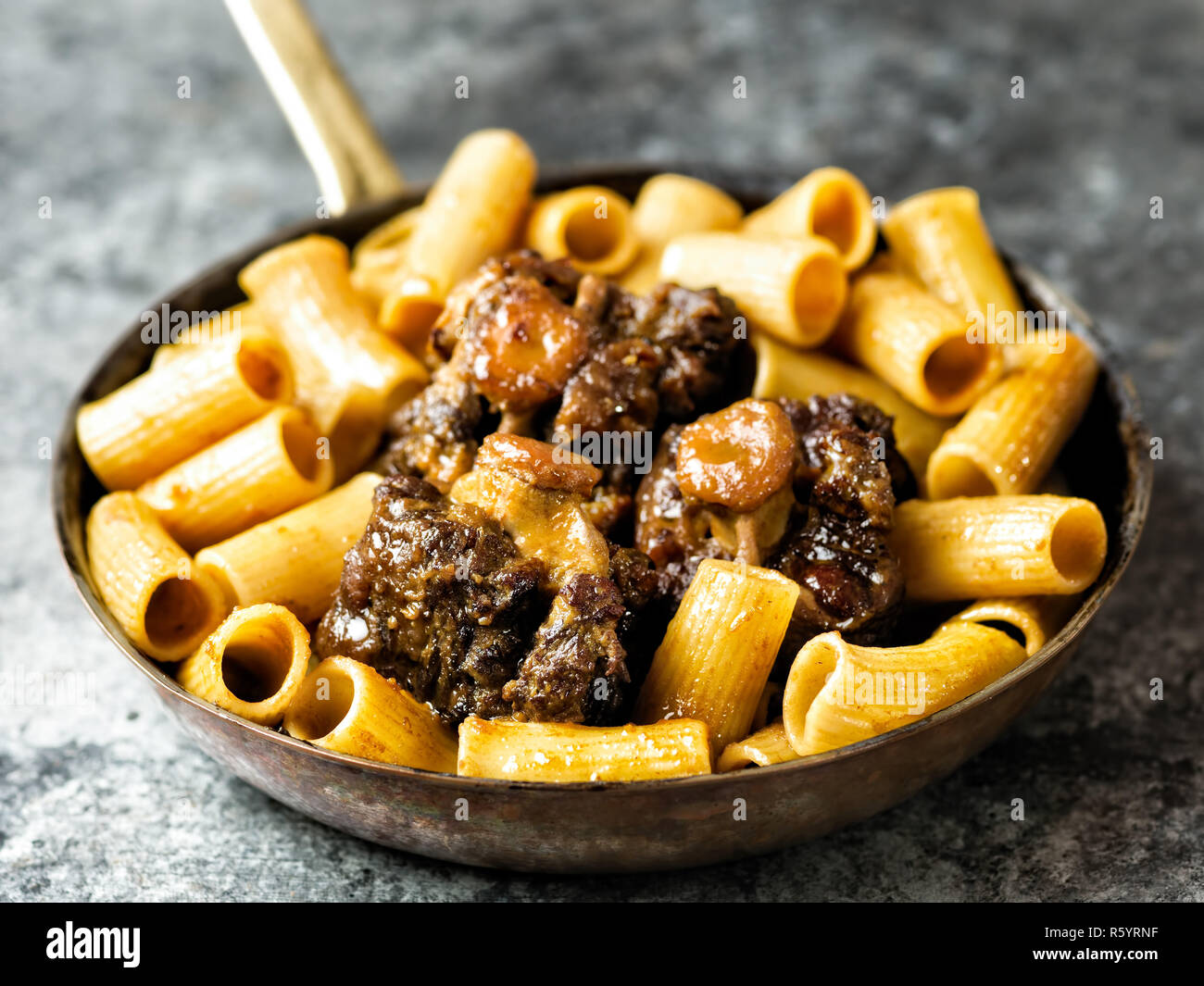 rustic italian oxtail ragu pasta Stock Photo - Alamy