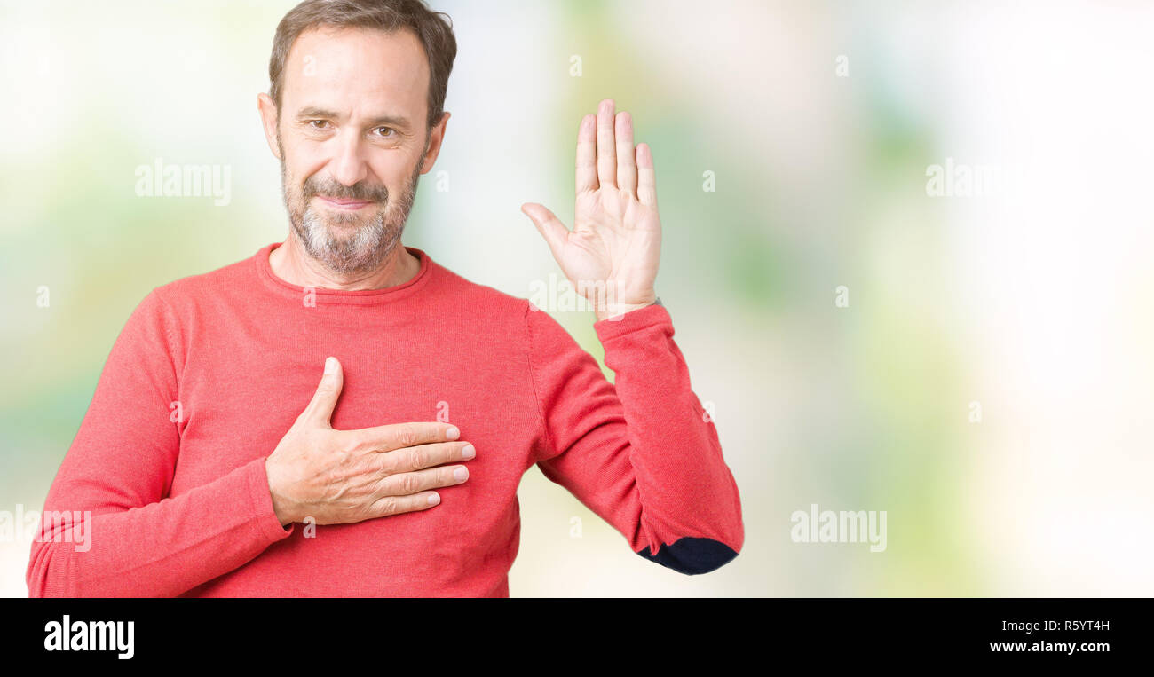 Handsome middle age hoary senior man wearing winter sweater over ...