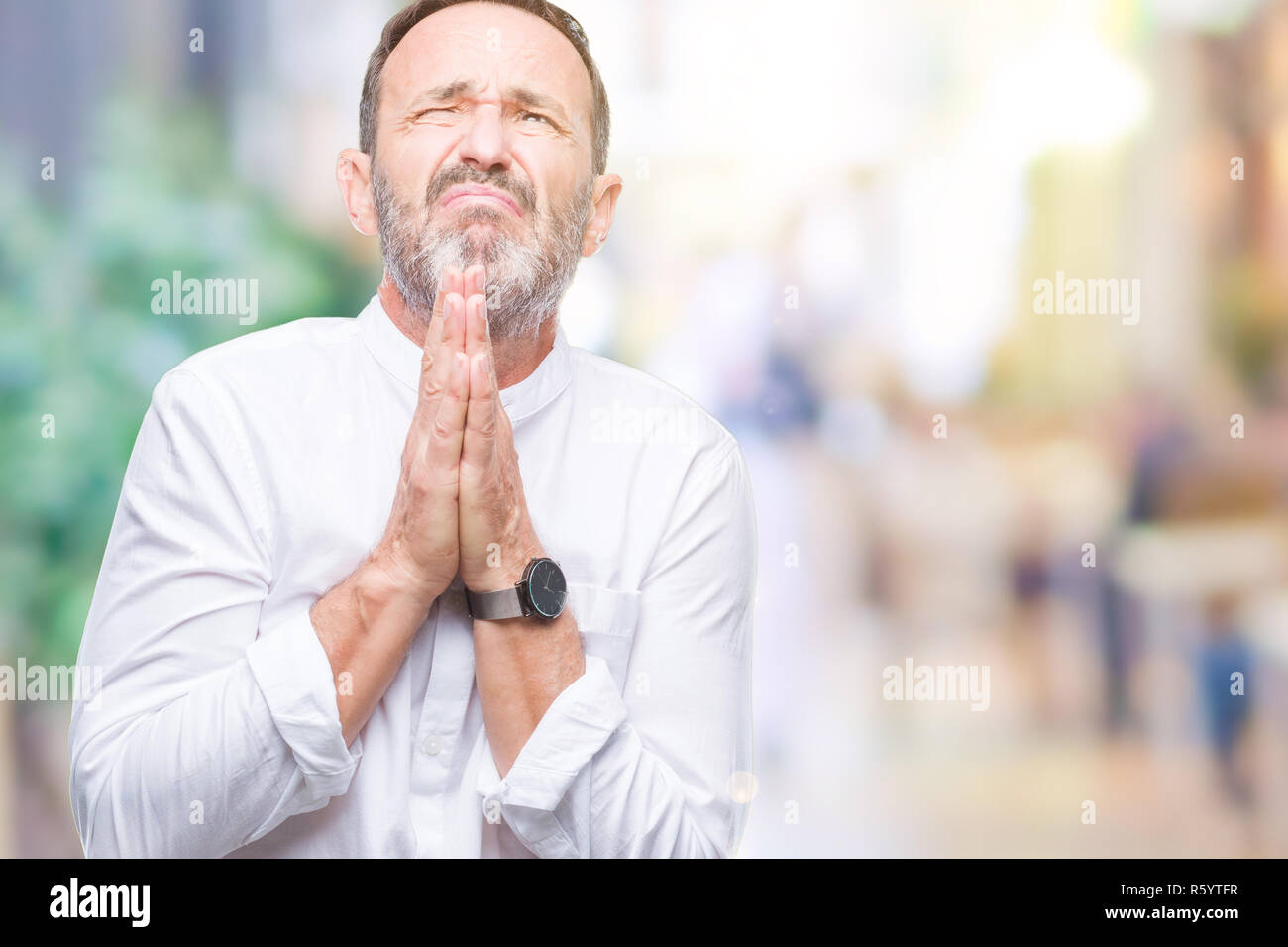 Middle age hoary senior man over isolated background begging and ...