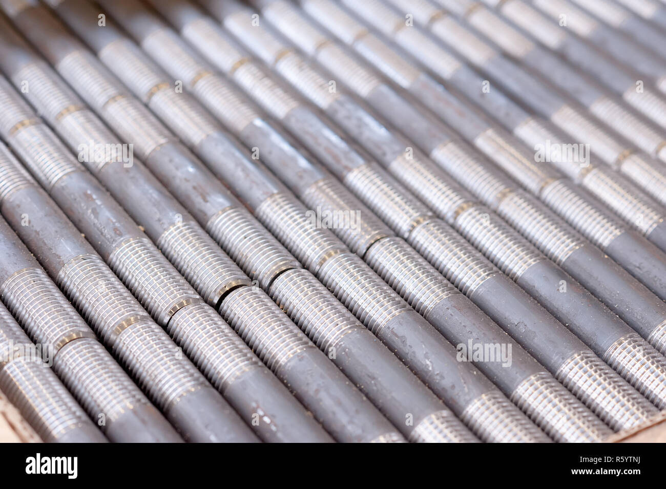 tubes with threaded threads. in production. finished parts in a row ...