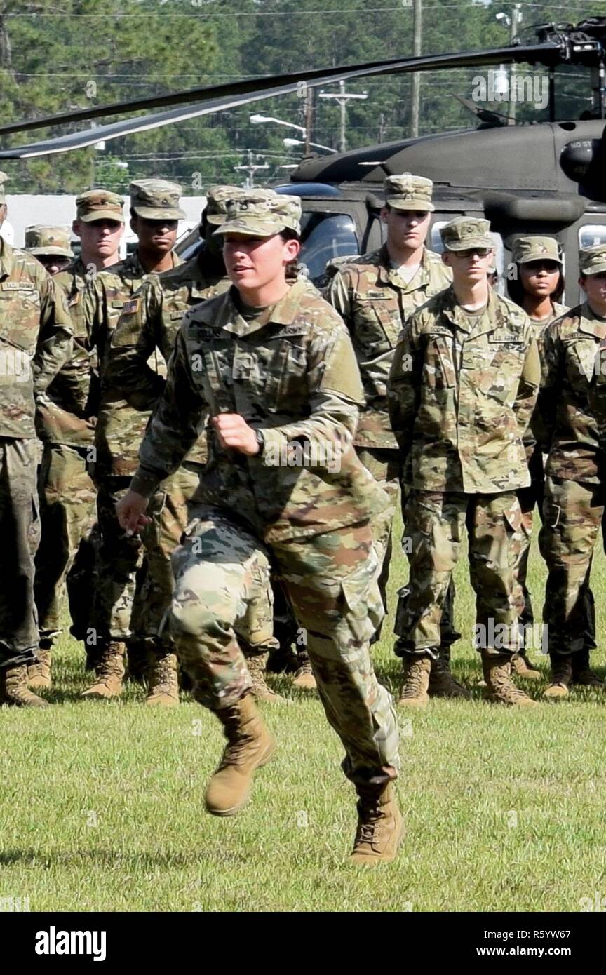 Private 1st Class Megan Collins runs to join a formation of Georgia ...