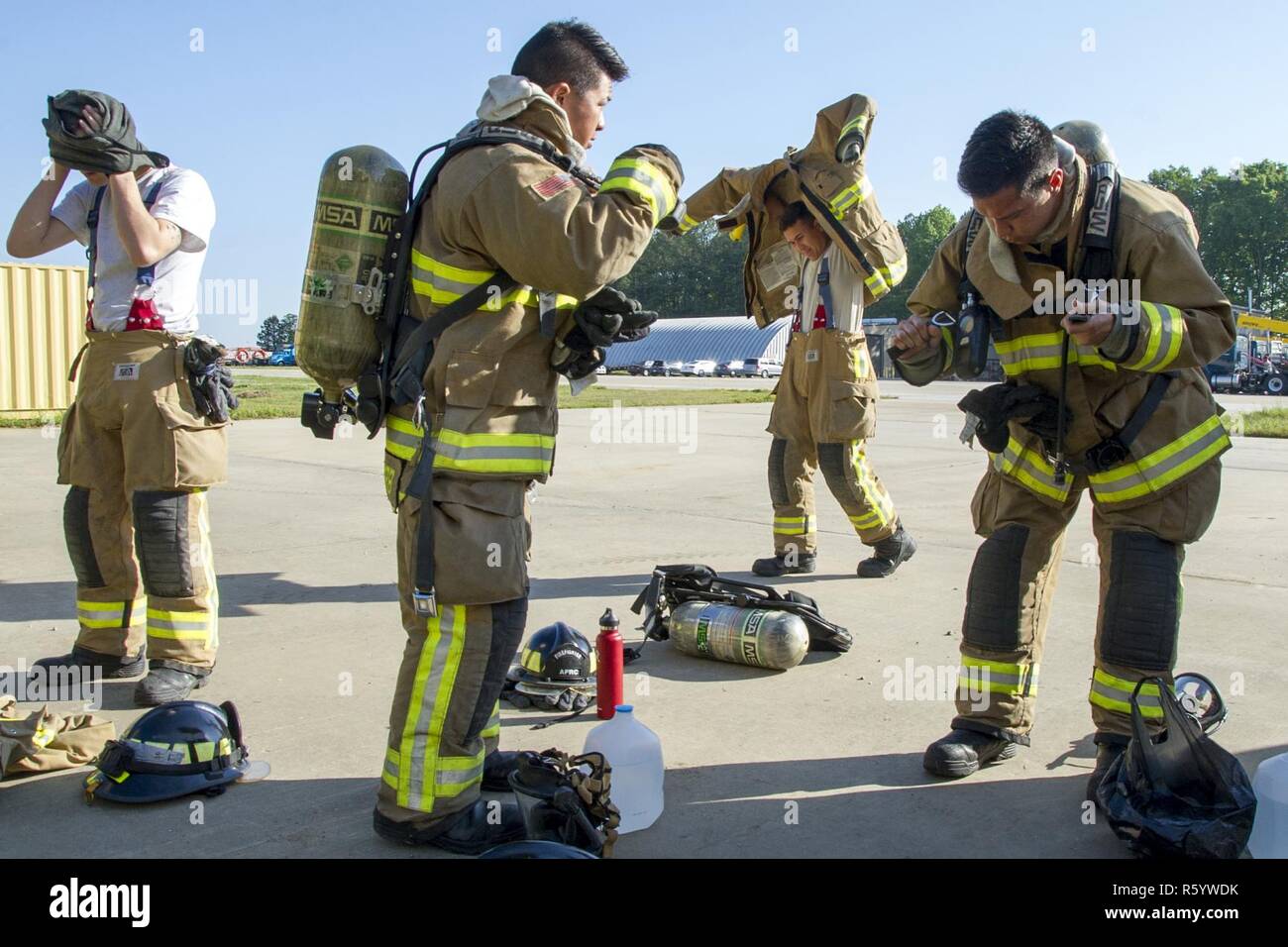 A team of Air Force Reserve firefighters prepare for a training ...