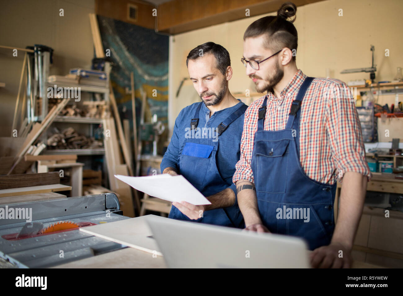 Small furniture factory workers hi-res stock photography and images - Alamy