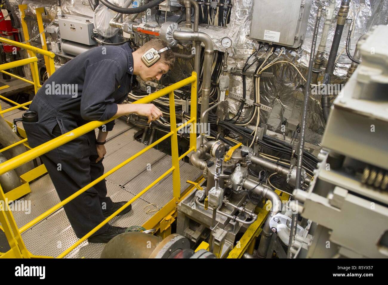 CHANGI, Singapore (April 21, 2017) Lt. James Berry visually inspects an ...