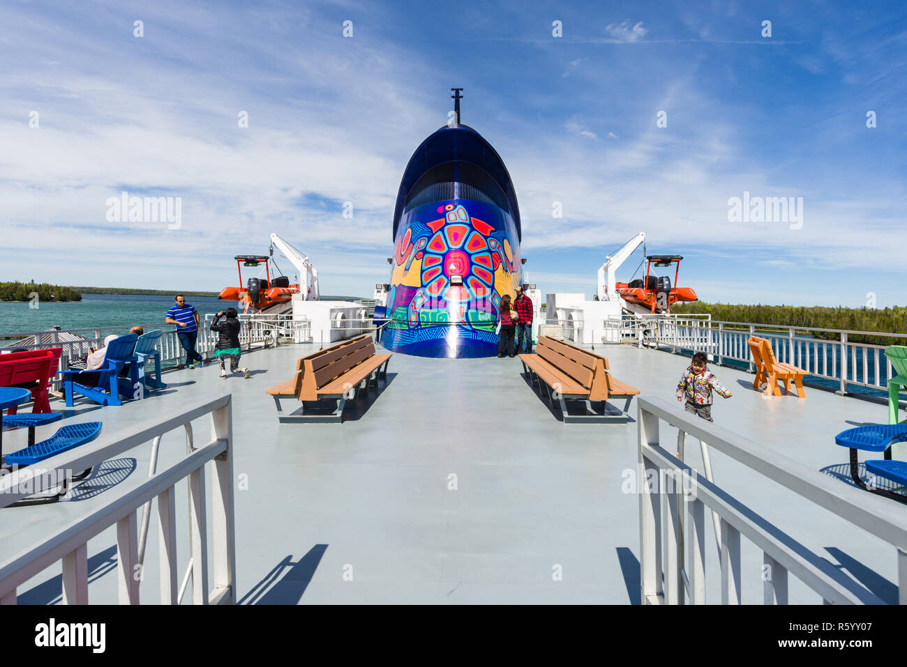 Passengers on the top deck of the Chi-Cheemaun ferry as it departs ...