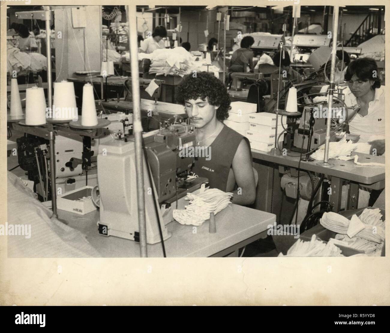 men and women using swing machines Stock Photo - Alamy