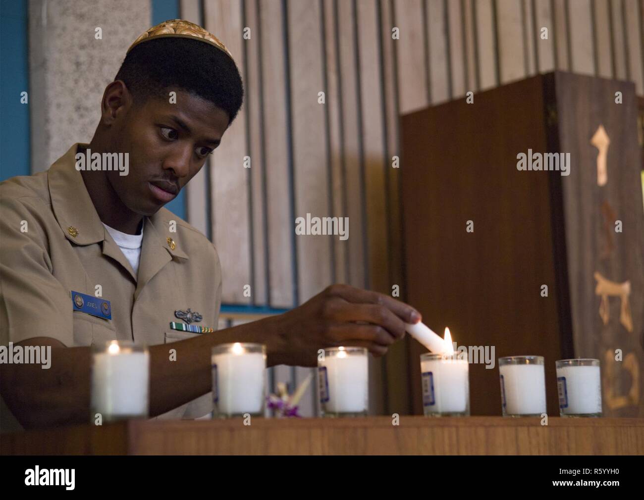 PEARL HARBOR (April 24, 2017) Chief Jones lights the six Yartzeit ...