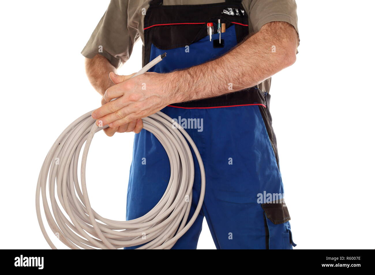 electric worker with cable in hand Stock Photo - Alamy