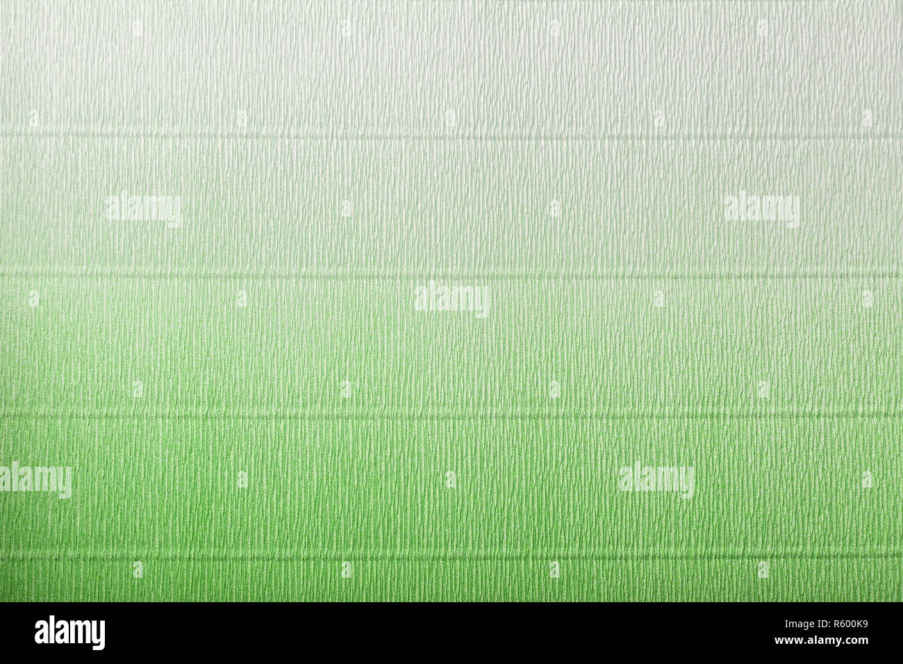 Texture of corrugated light green and white paper with vertical ...