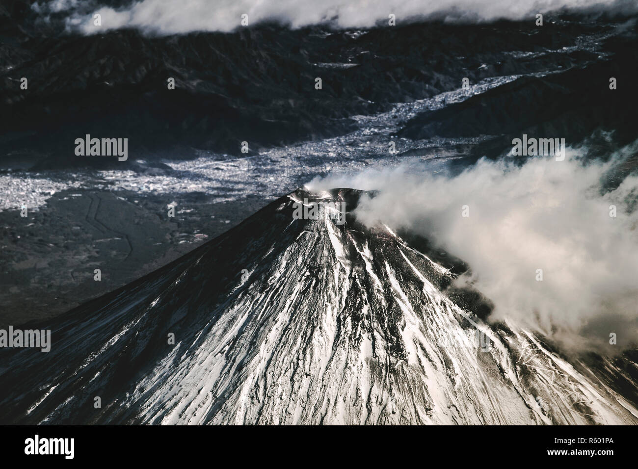 Aerial view of the snow covered Fuji San (Fujiyama) as seen from an ...