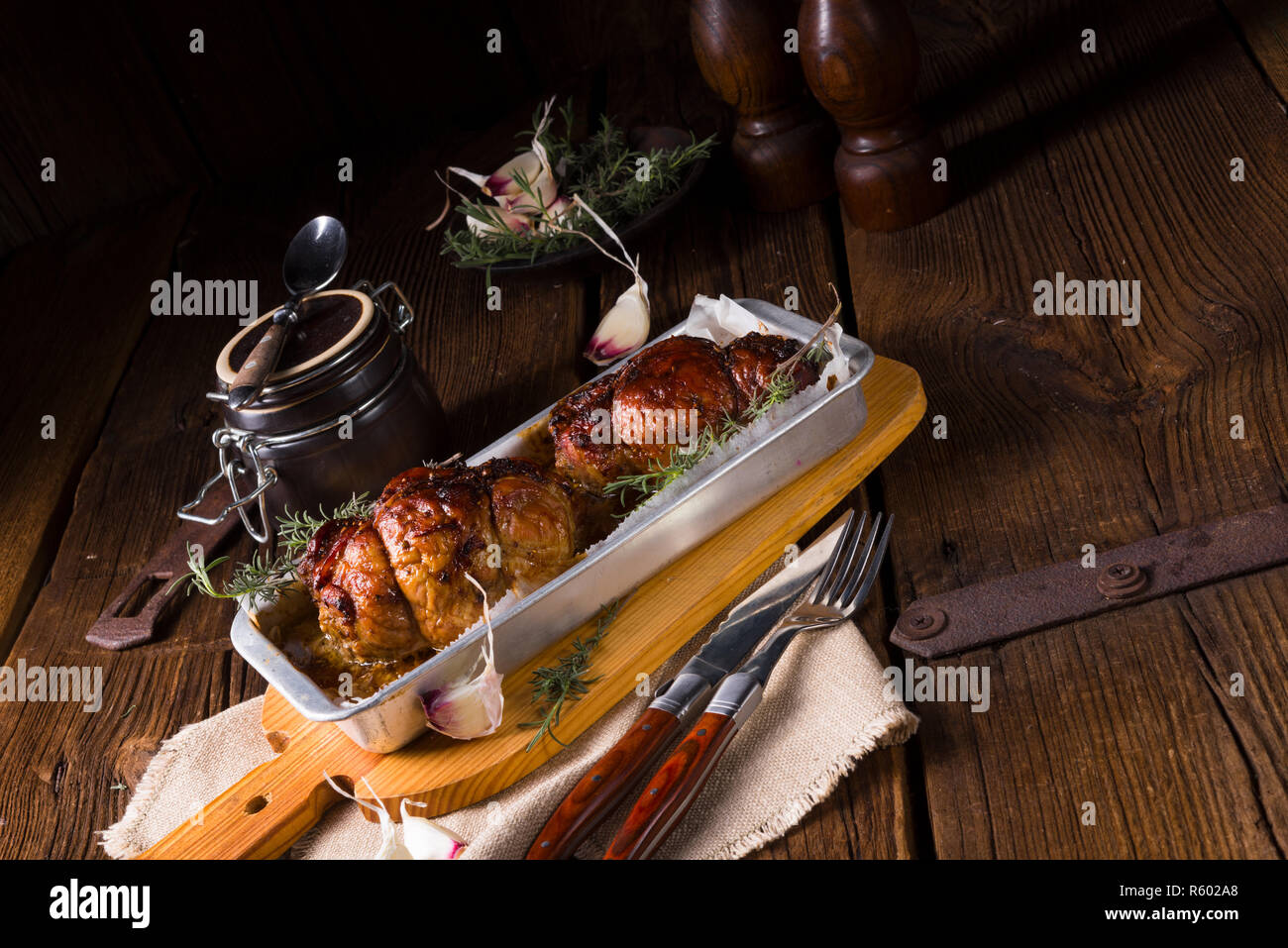 small rolling roast with dried fruit and bacon Stock Photo - Alamy