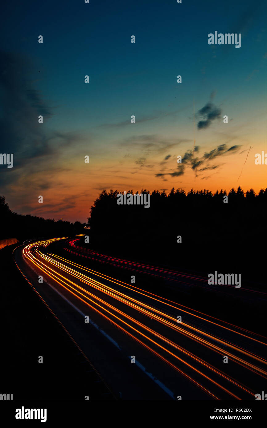 blue hour on the highway Stock Photo - Alamy