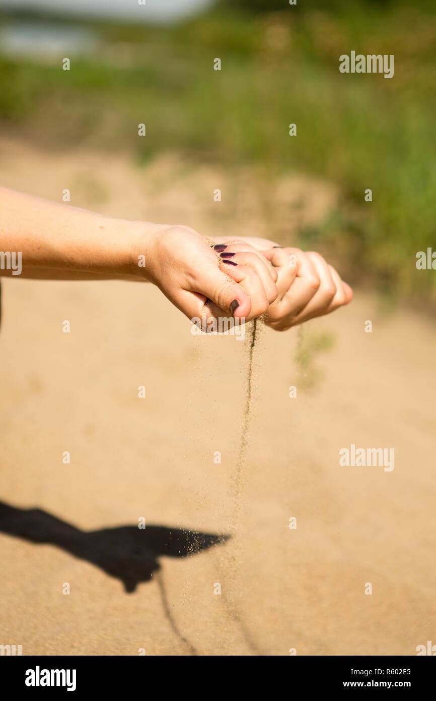 Hourglass time sand slipping hi-res stock photography and images - Alamy