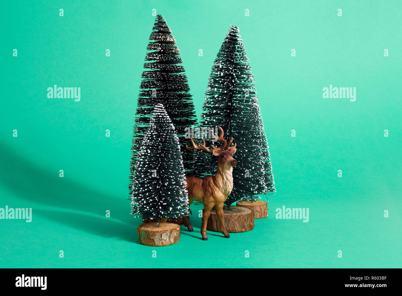 green forest firs and reindeer Stock Photo - Alamy