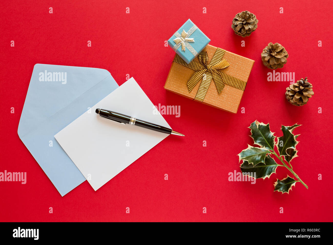Christmas letter over a red background Stock Photo - Alamy