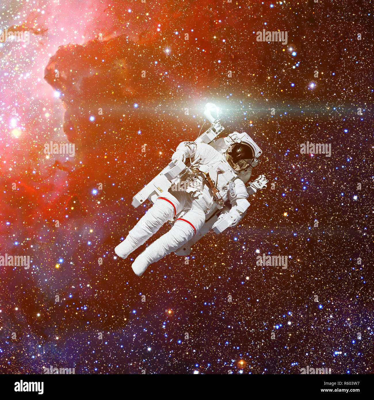 Astronaut in outer space. Nebula and stars on the background Stock ...