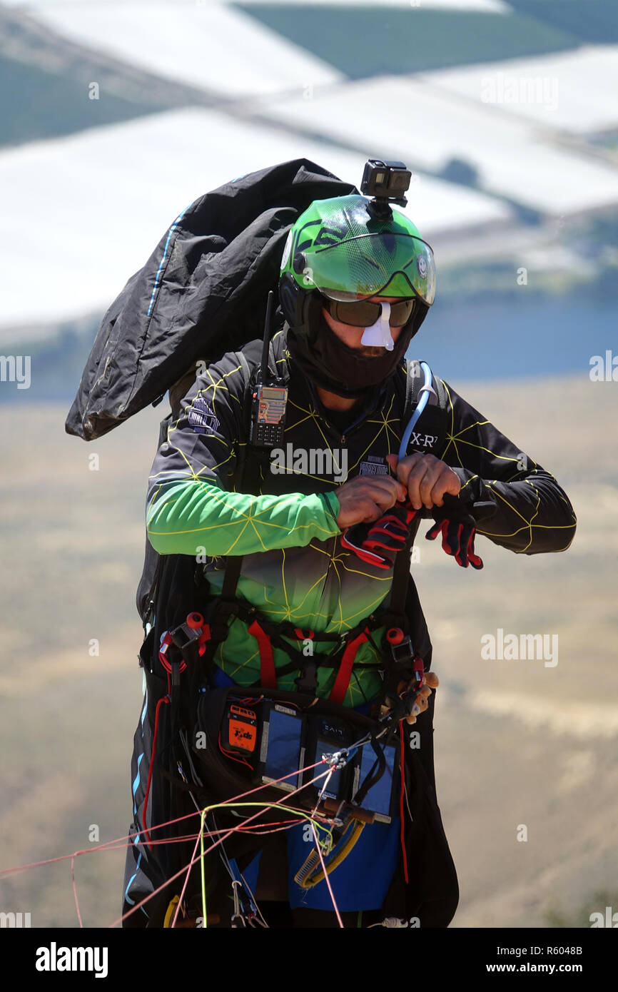A paraglider pilot readies himself tor a flight Stock Photo - Alamy