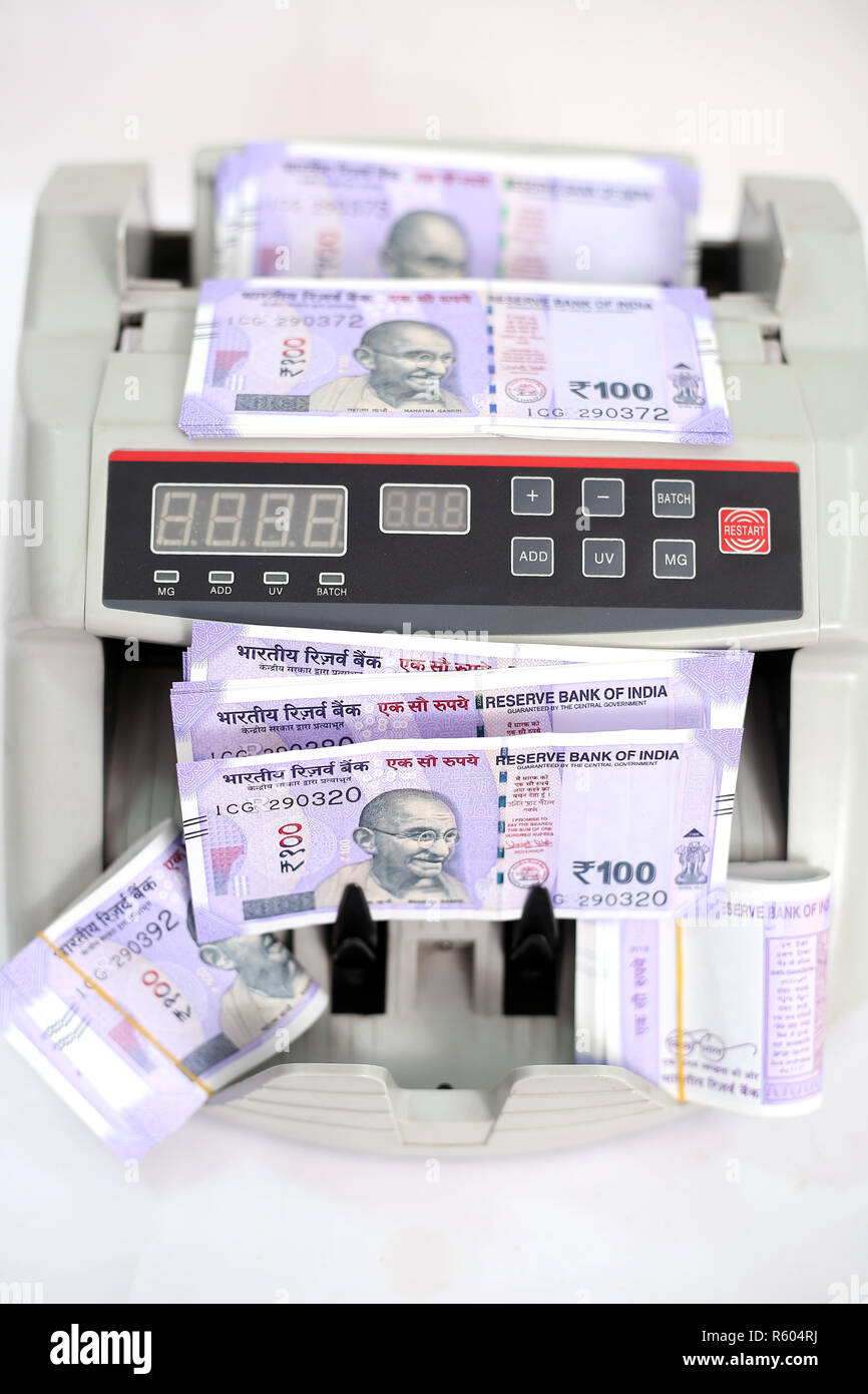 Money counting machine for counting new Indian currency. Isolated on ...