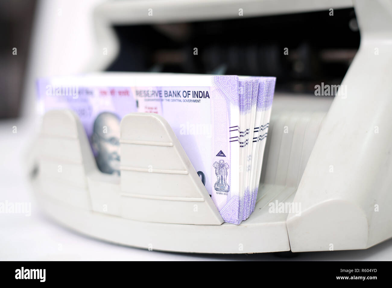 Bank note on count machine. Isolated on the white background Stock ...