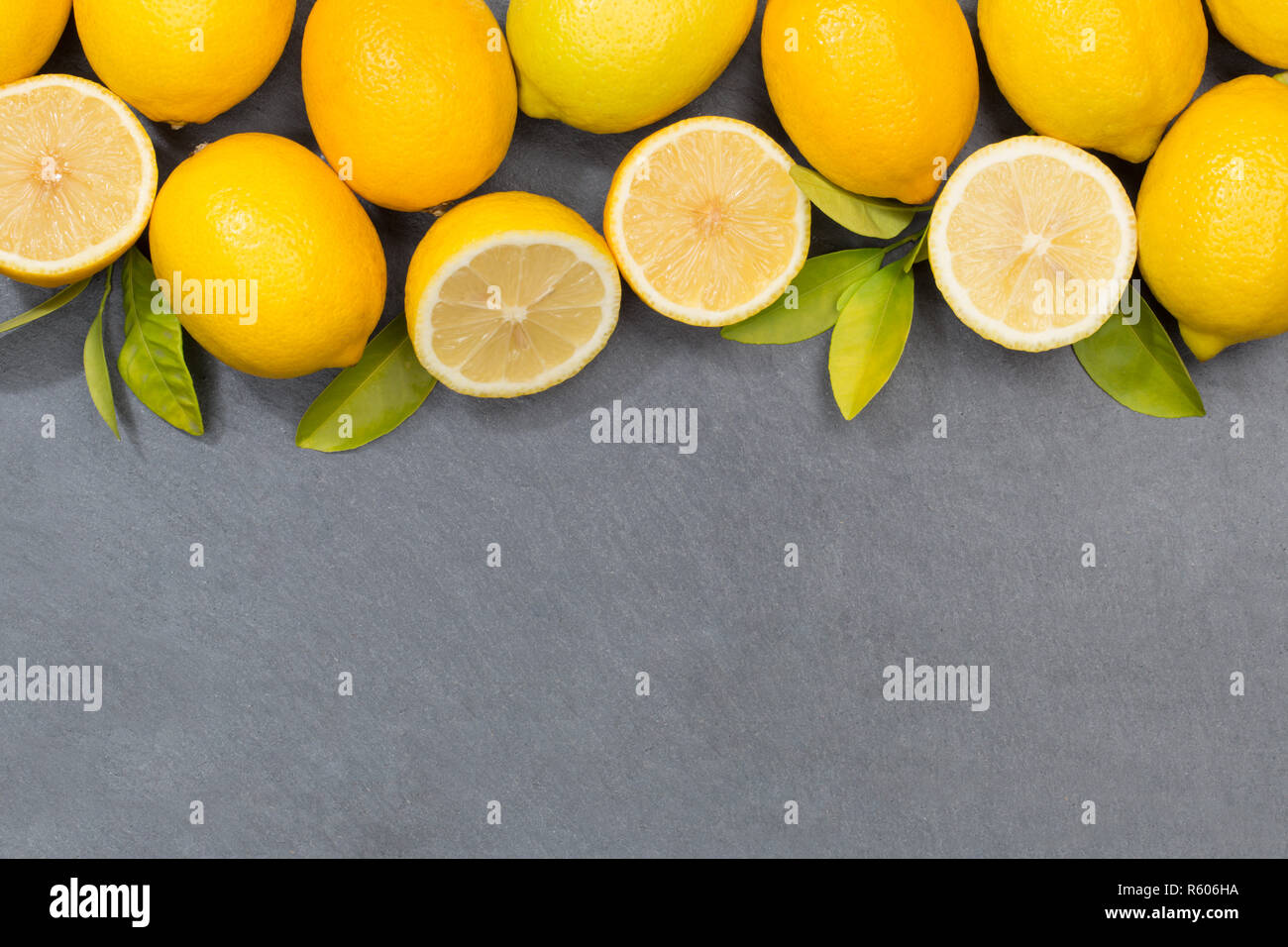 lemon lemon fruits copy space slate from above Stock Photo - Alamy