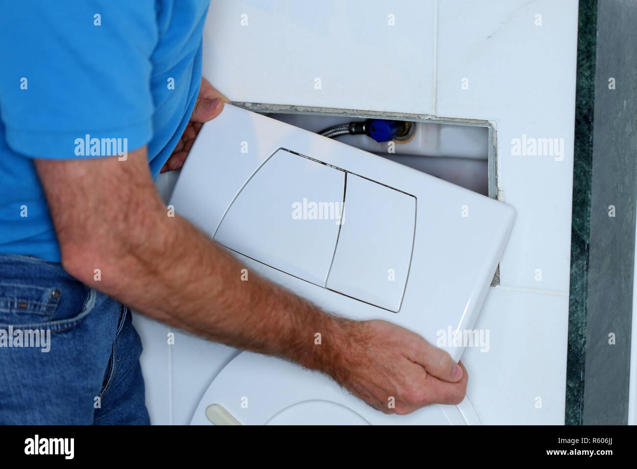 installation of a cistern Stock Photo - Alamy