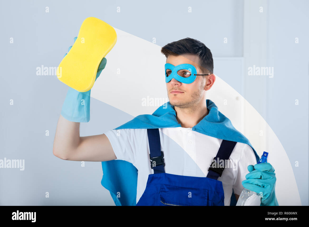 Superhero Janitor Wiping Glass Stock Photo - Alamy