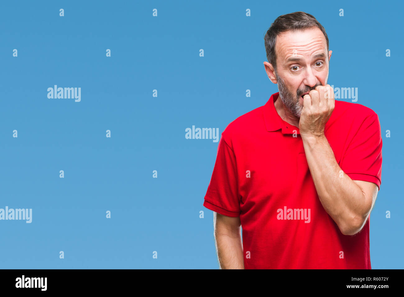 Middle age hoary senior man over isolated background looking stressed ...