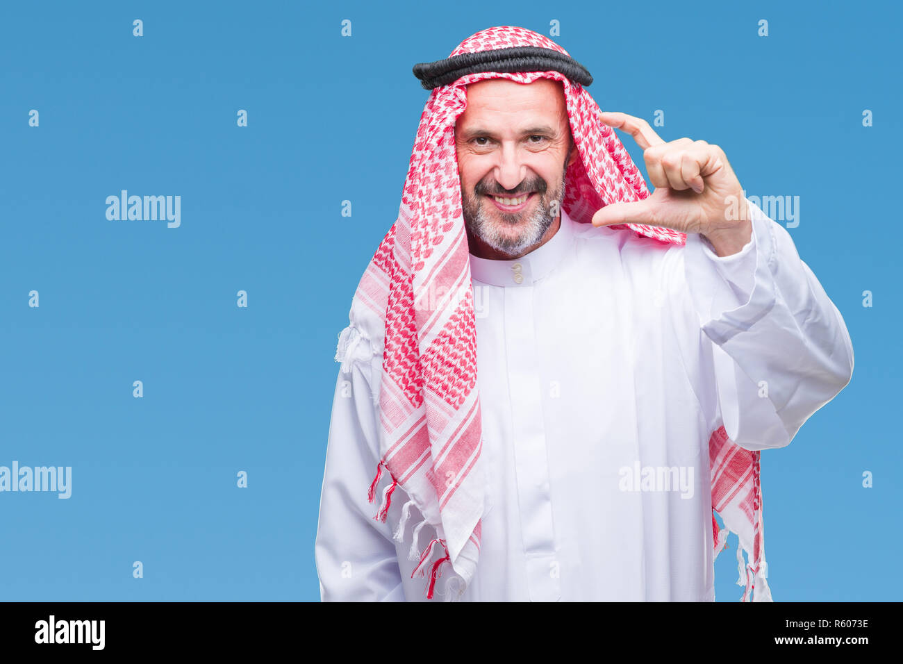 Senior arab man wearing keffiyeh over isolated background smiling and ...