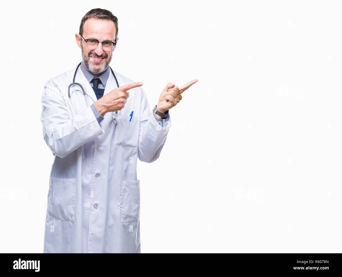 Middle age senior hoary doctor man wearing medical uniform isolated ...