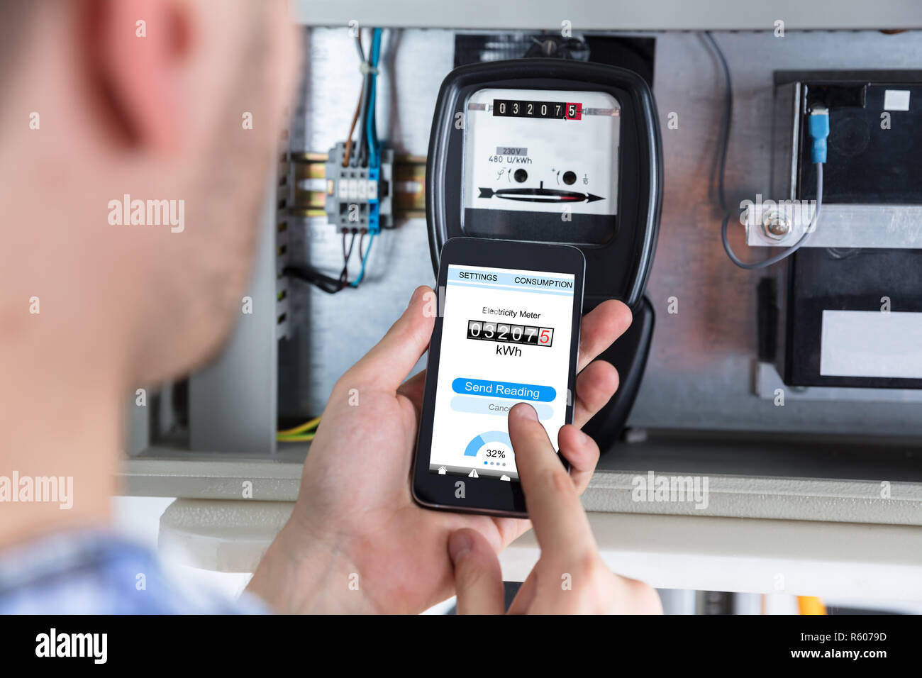Man Reading Electric Meter Stock Photo - Alamy