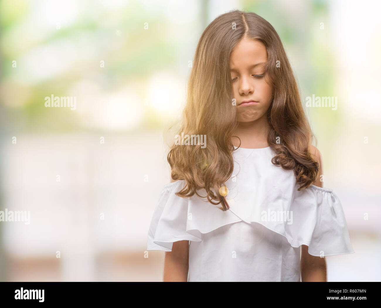 Brunette hispanic girl depressed and worry for distress, crying angry ...