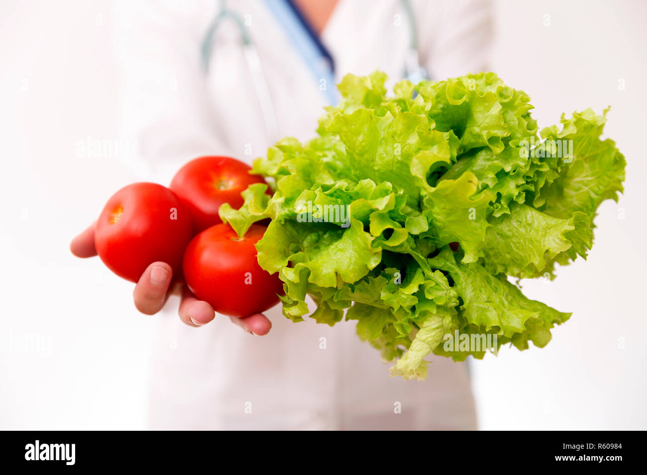 Vegetable diet nutrition and medication concept. Nutritionist offers ...