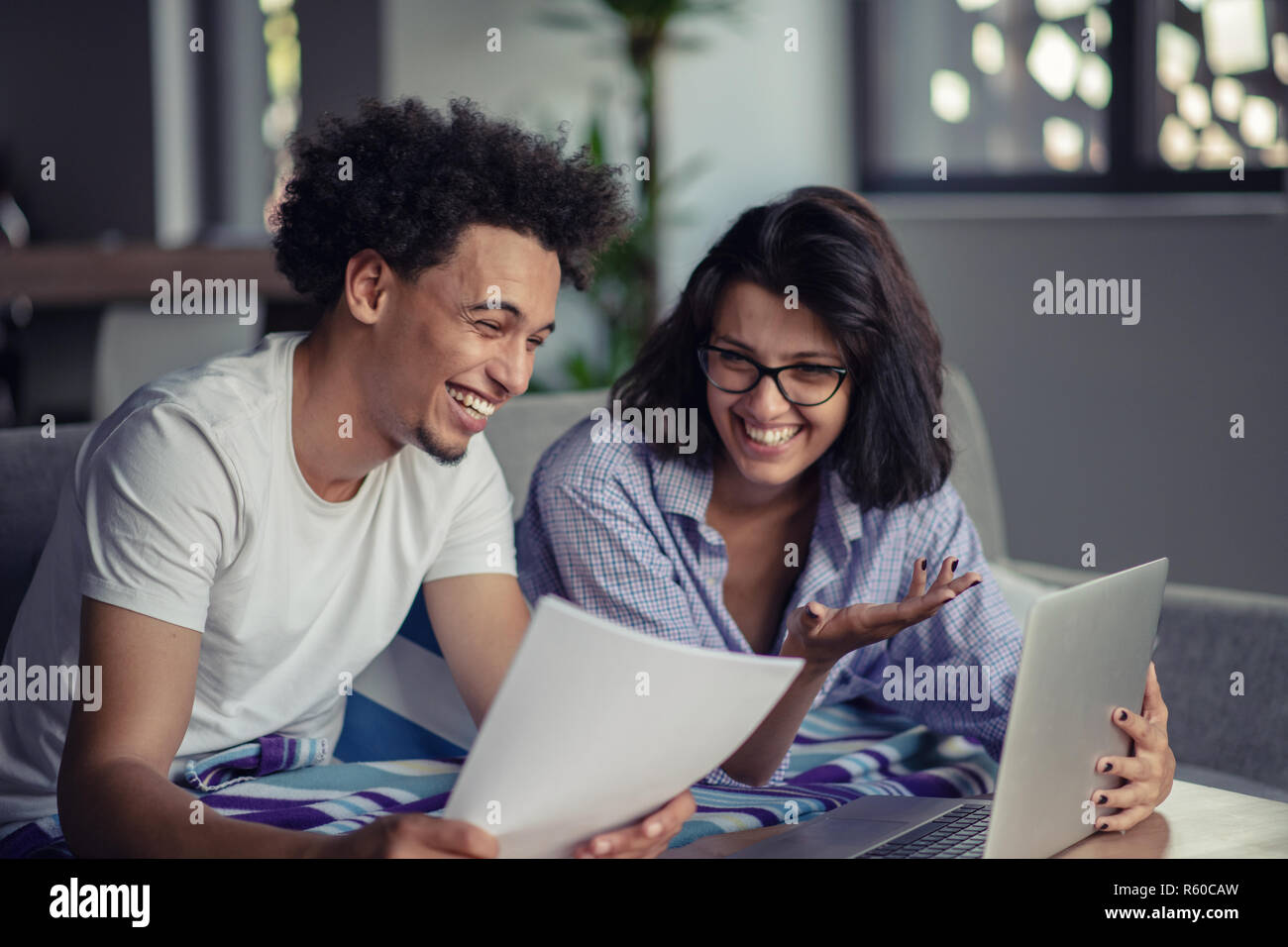 Couple worried laptop calculator hi-res stock photography and images ...