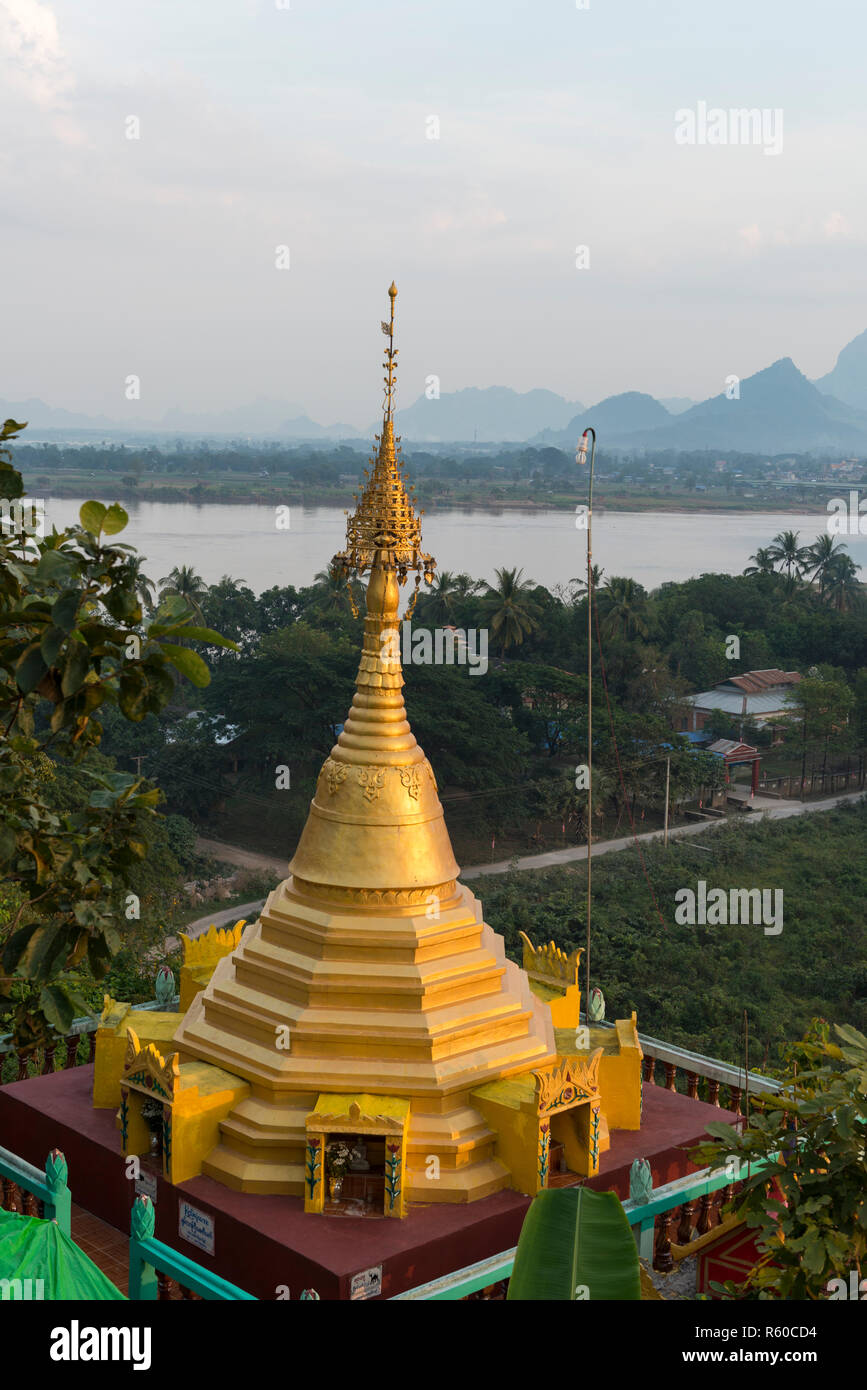HPA-AN, MYANMAR - 18 NOVEMBER, 2018: Vertical picture of golden pagoda ...