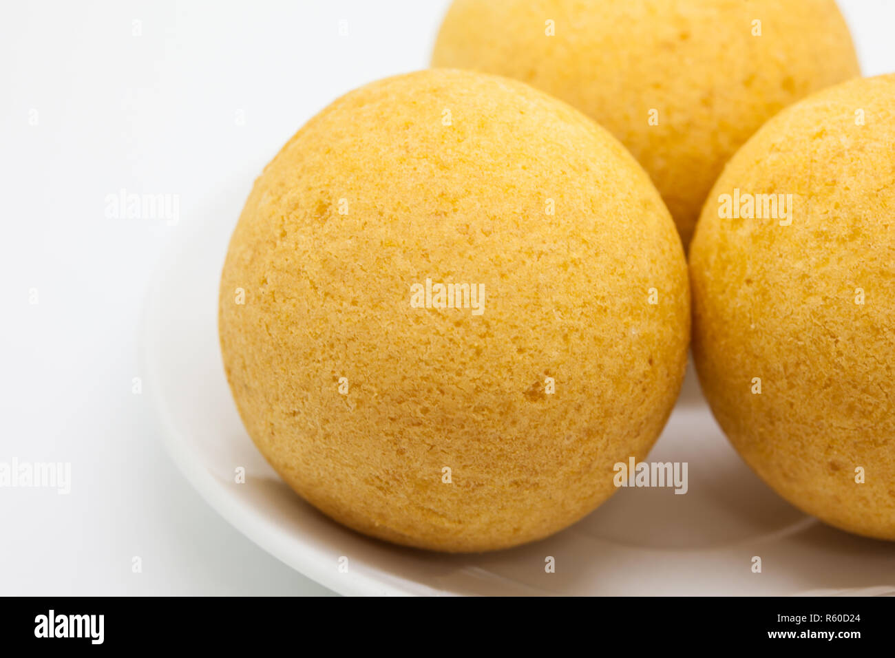 Traditional Colombian buÃ±uelos (Deep Fried Cheese Bread) isolated on ...