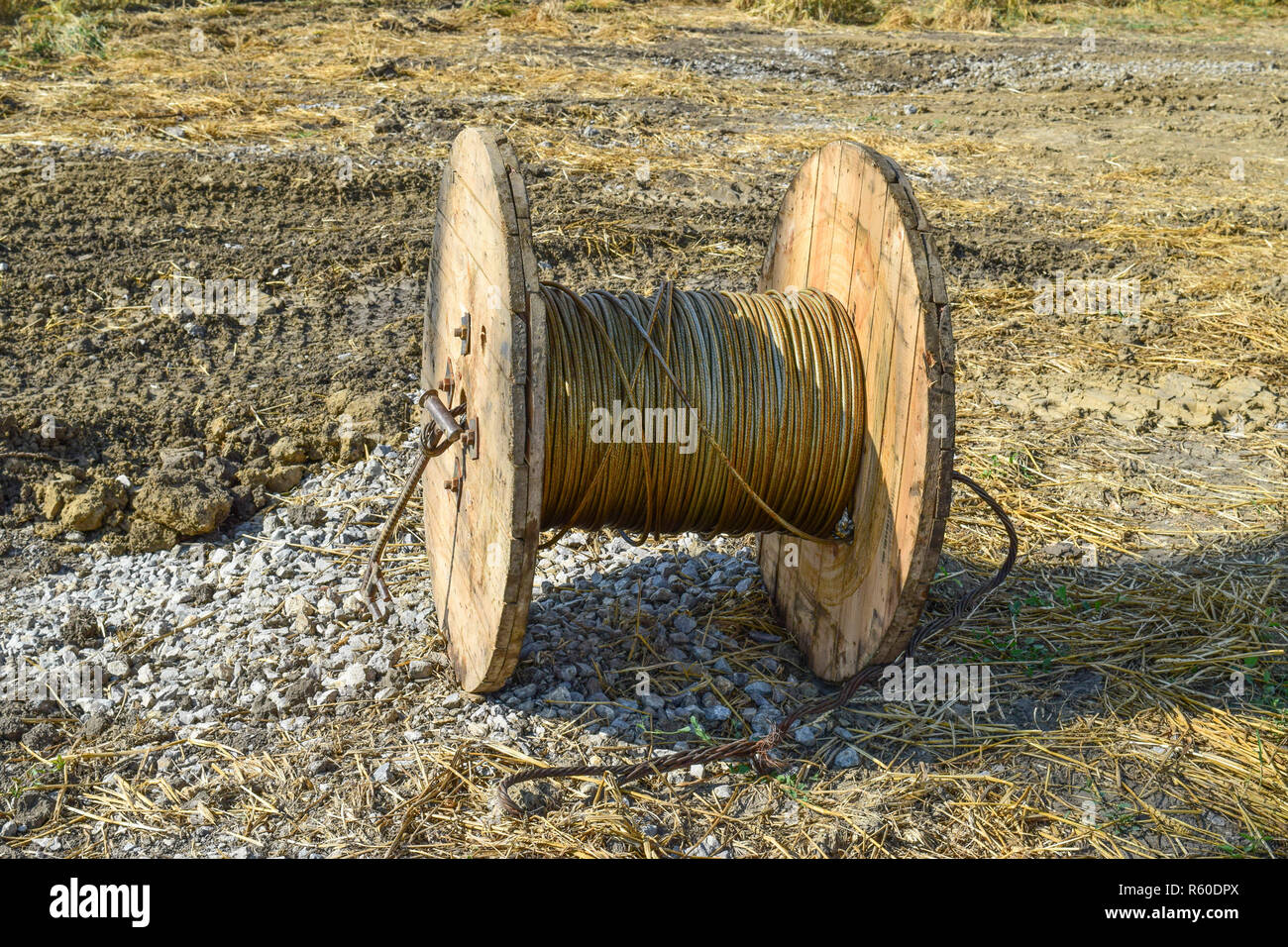 The unwinding of the high-voltage wire from the spool storage ba Stock ...