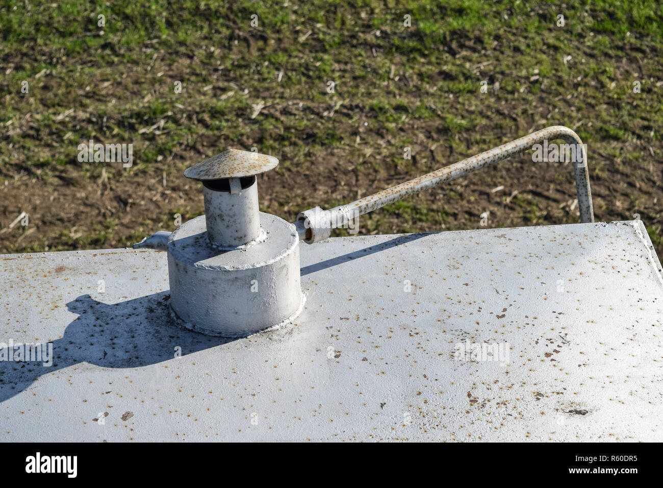 Safety valve on the tank with a tube to drain the liquid Stock Photo ...