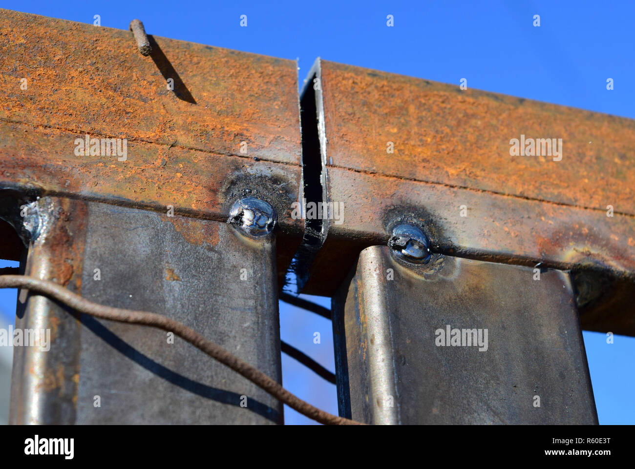 Connection by welding of metal square pipes Stock Photo - Alamy