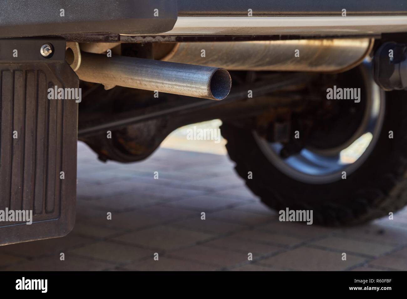 Smoking car exhaust pipe hi-res stock photography and images - Alamy