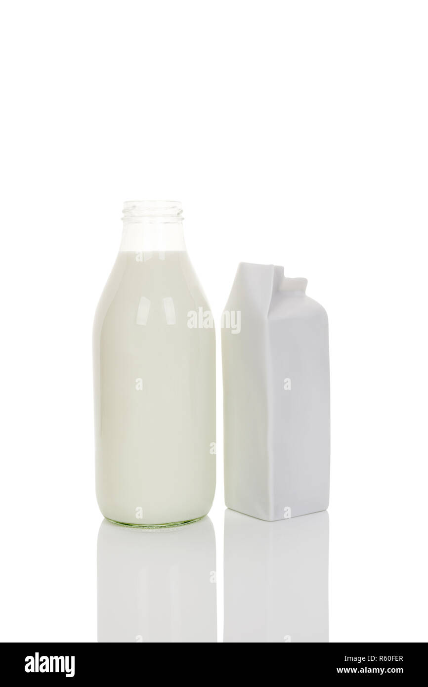 Bio milk in glass and carton bottle Stock Photo - Alamy