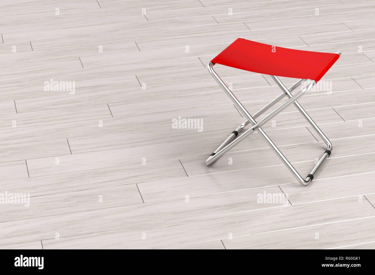 Folding stool on wooden floor Stock Photo - Alamy