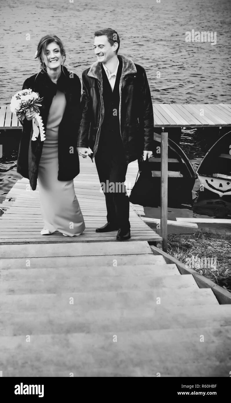 Happy couple standing in Black and White Stock Photos & Images - Alamy