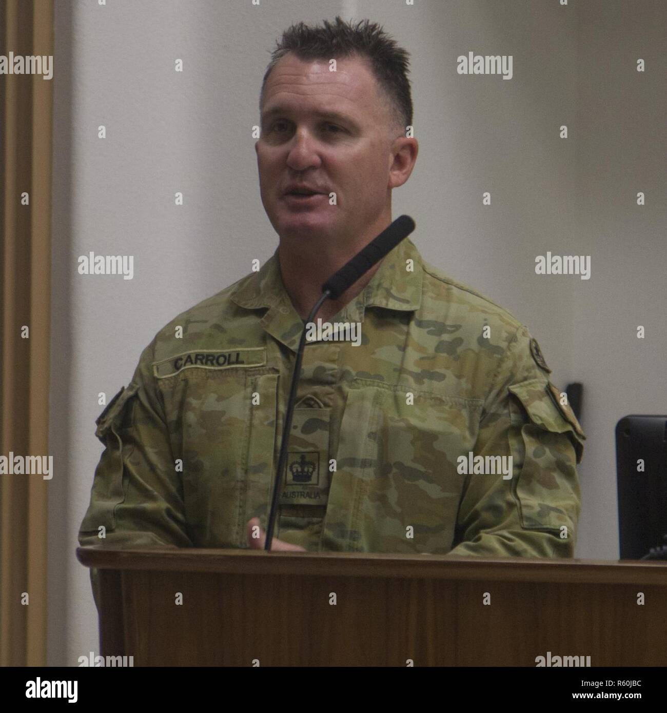 Warrant Officer Class 2 Michael Carroll, exchange infantry weapons ...