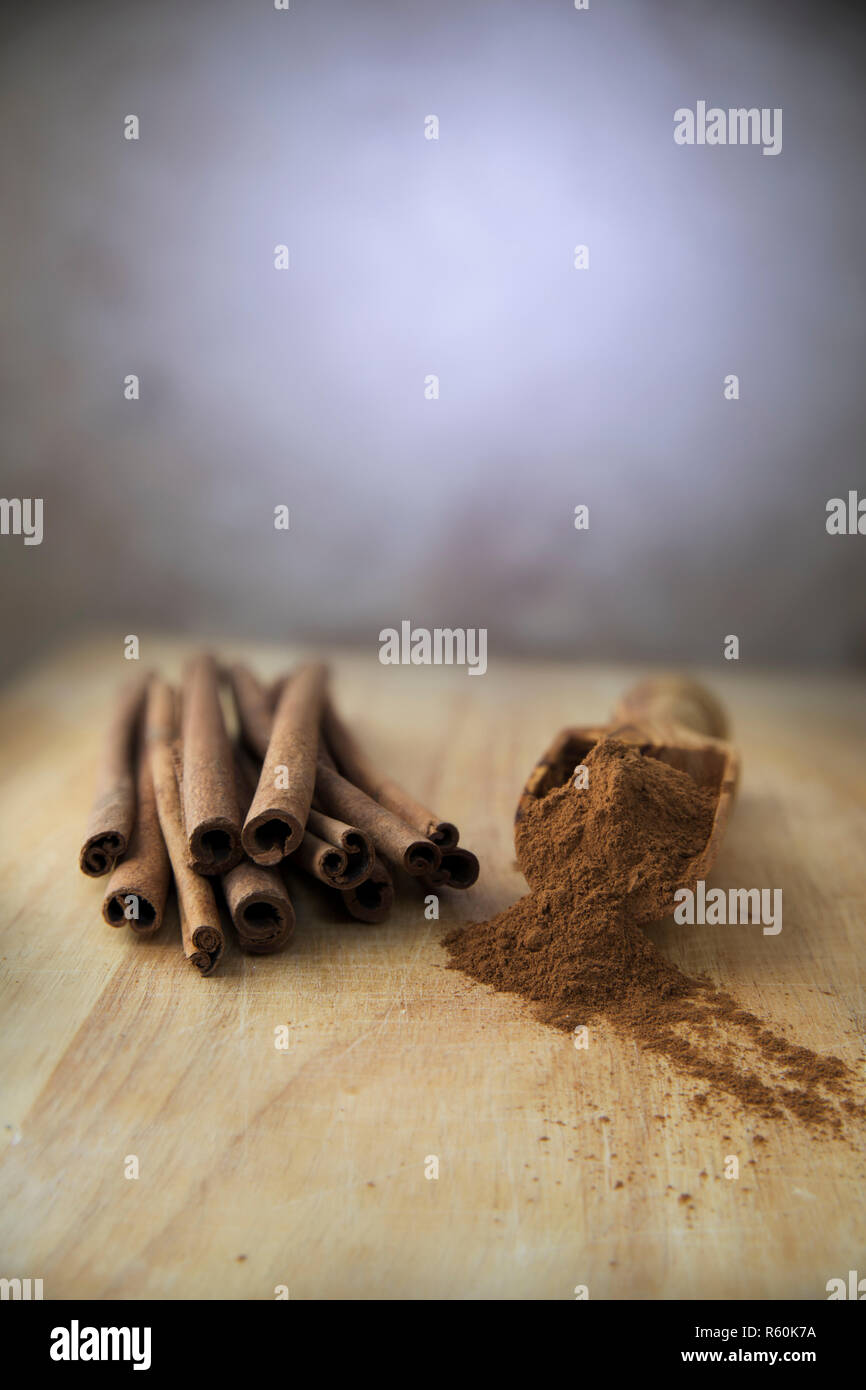 Cinnamon Powder and Sticks Vertical Stock Photo - Alamy