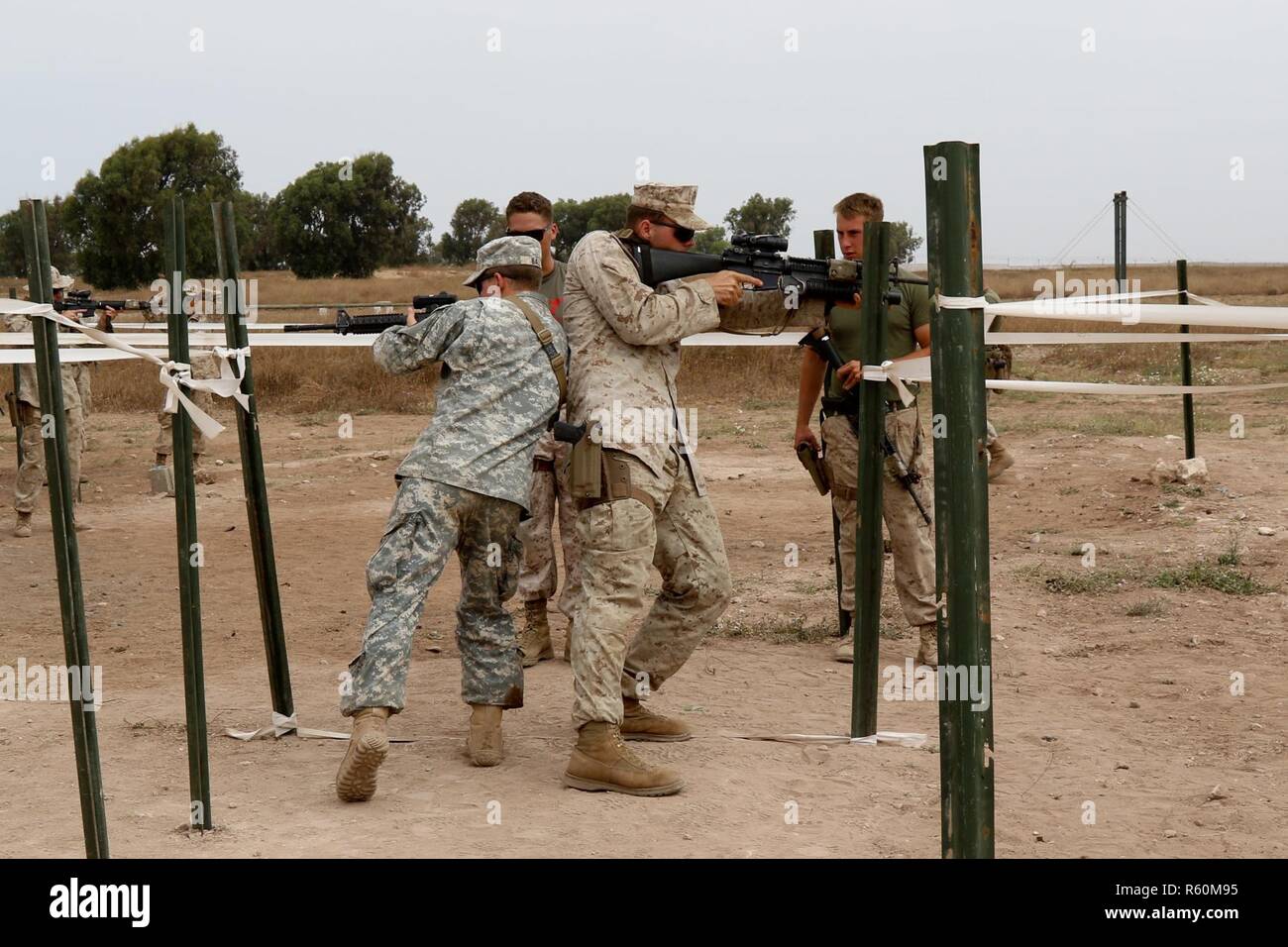 U.S. Soldier and Marine representing the 805th Military Police Company ...